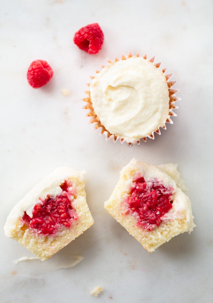 Raspberry-Filled Vanilla Cupcakes with Buttercream Frosting ...