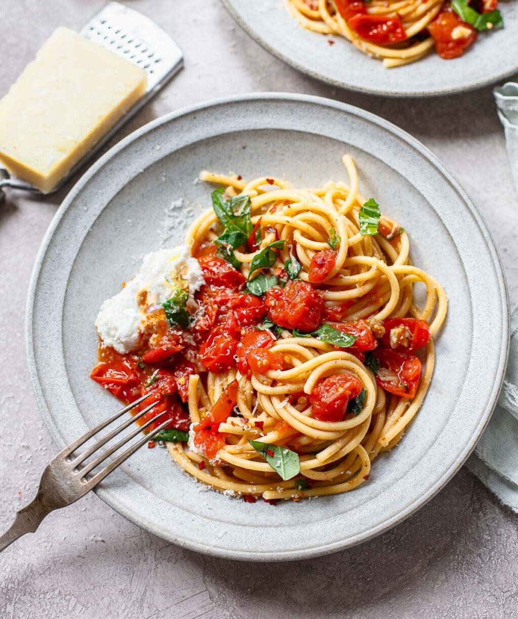 Bucatini Pasta with Sheet Pan Tomato Sauce - Familystyle Food
